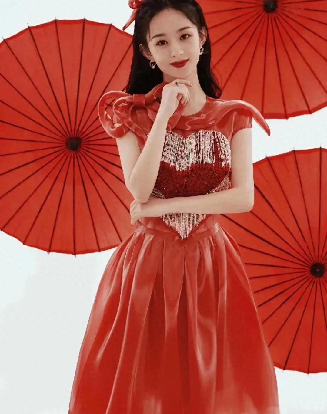 Yang Mi and Zhao Liying compete in Chinese-style red dresses. Each has ...