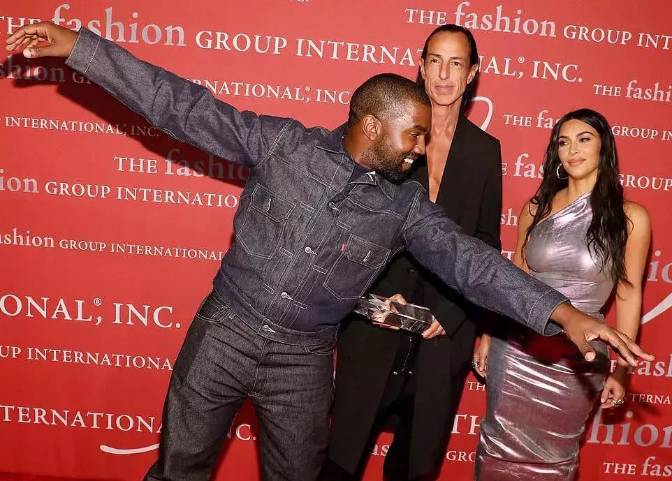 Kim Kardashian walked the red carpet, smiling sweetly as she listened ...