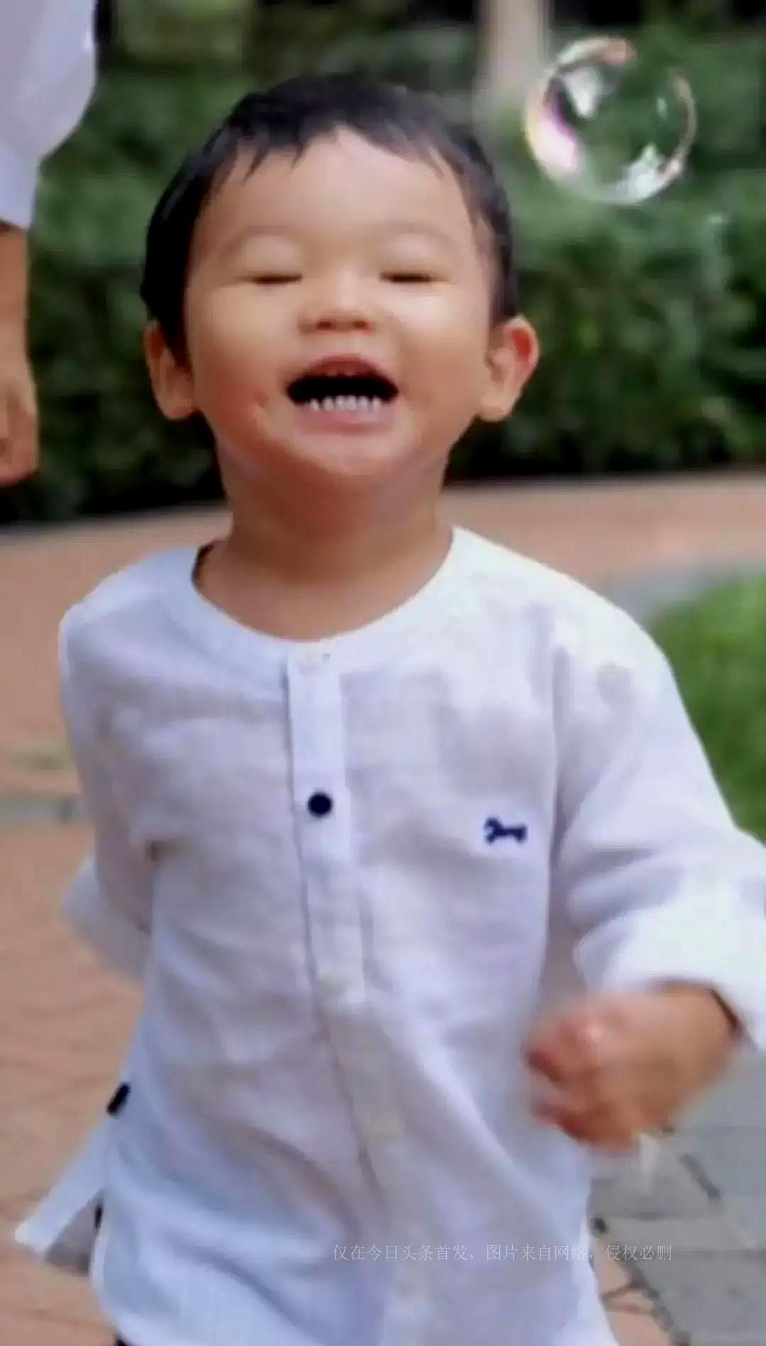 The host posted a photo of his son. He has a round face with two ...