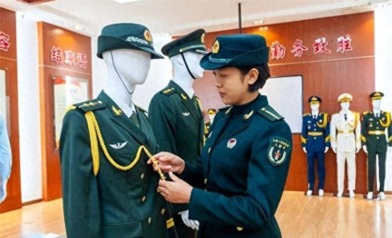 What is the "yellow rope" hanging on the military uniforms of various ...