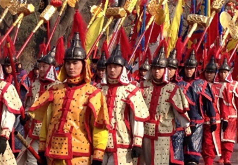 What is the "yellow rope" hanging on the military uniforms of various ...