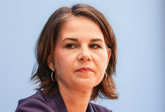 Germany wants to stand with the United States?Belle Burke's speech was ...