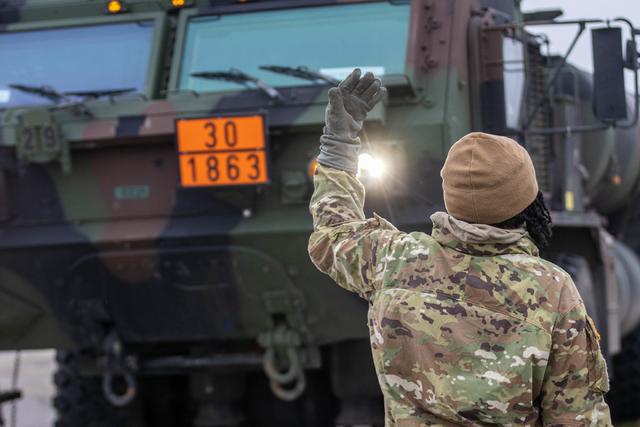 Refueling an AH-64 Apache during the Forward Arming and Refueling Point ...