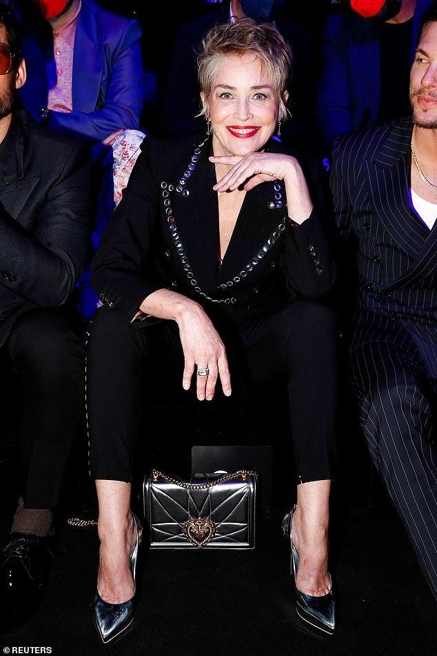 63-year-old Sharon Stone watched the show, accompanied by a fresh male ...