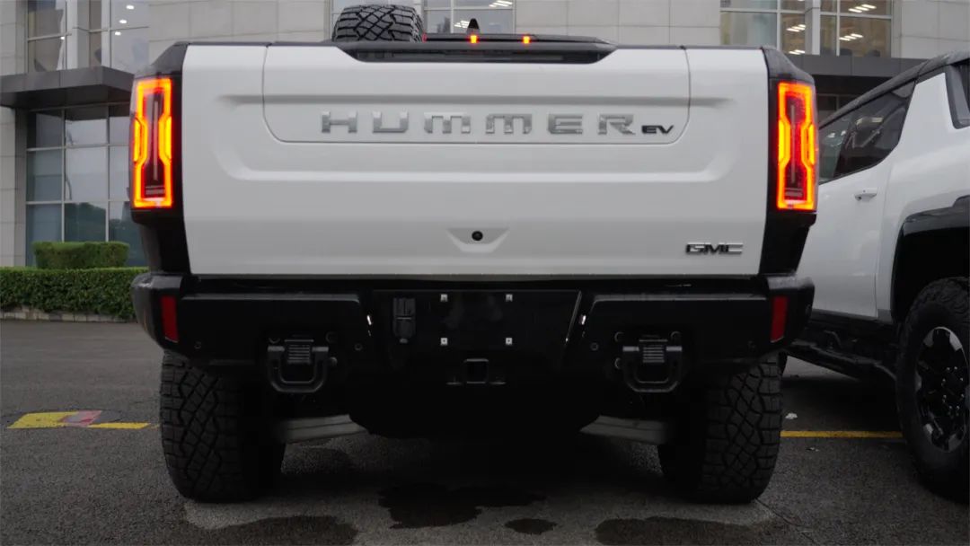 Real shot GMC HUMMER EV: environmentally friendly girl happy car, the ...