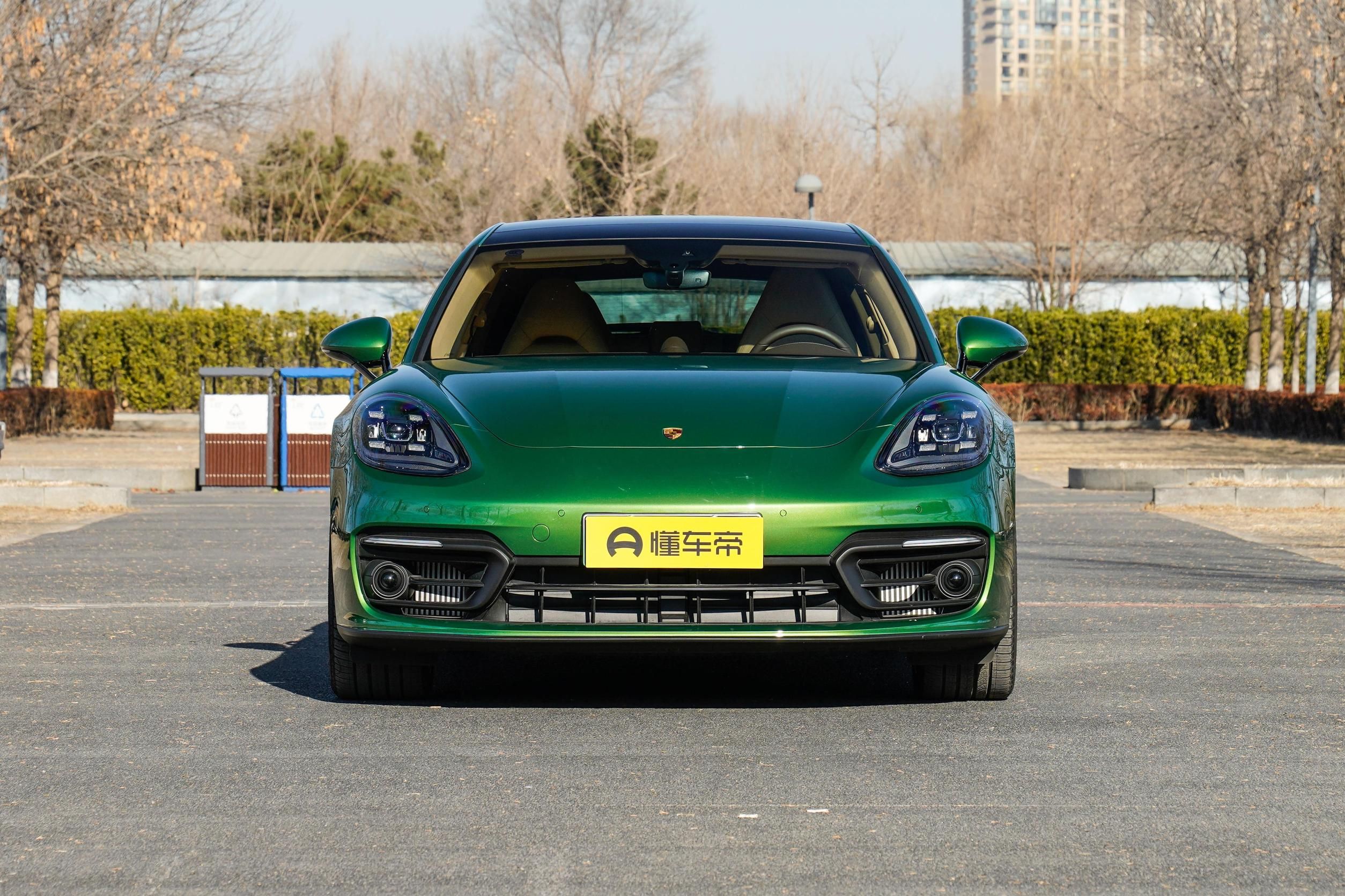 Panamera E-Hybrid, a large car with a twin-turbocharged engine, surging ...
