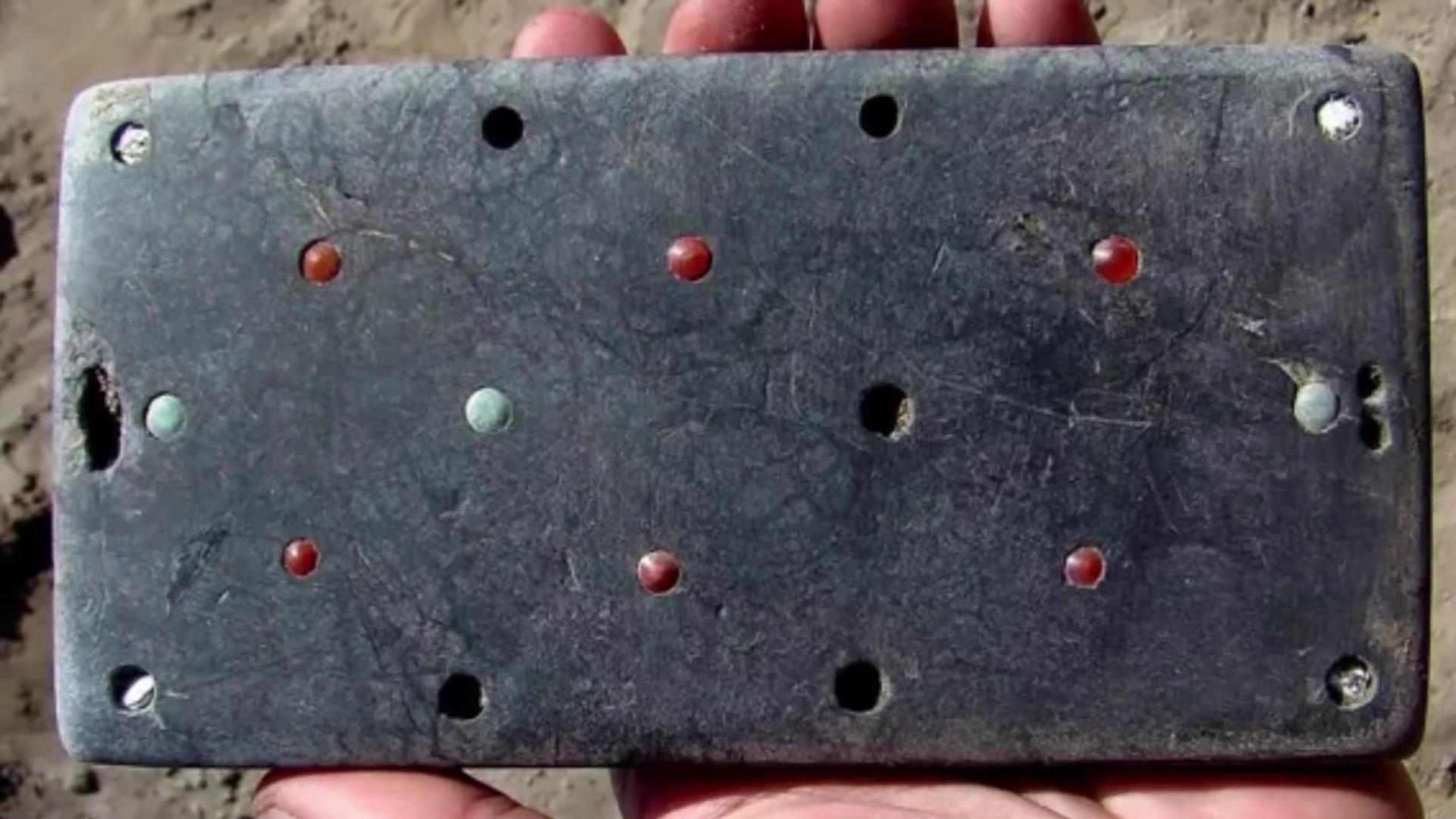 A smart phone buried for two thousand years is unearthed, a strange new ...