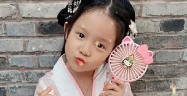 Kuo Tai Gan Wei takes a recent photo of her 6-year-old daughter. She ...