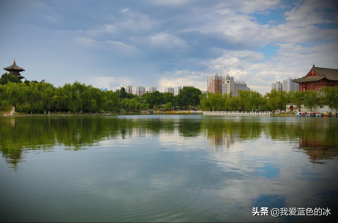 Early in the morning, head to the historic Xingqing Palace Park in Xi ...