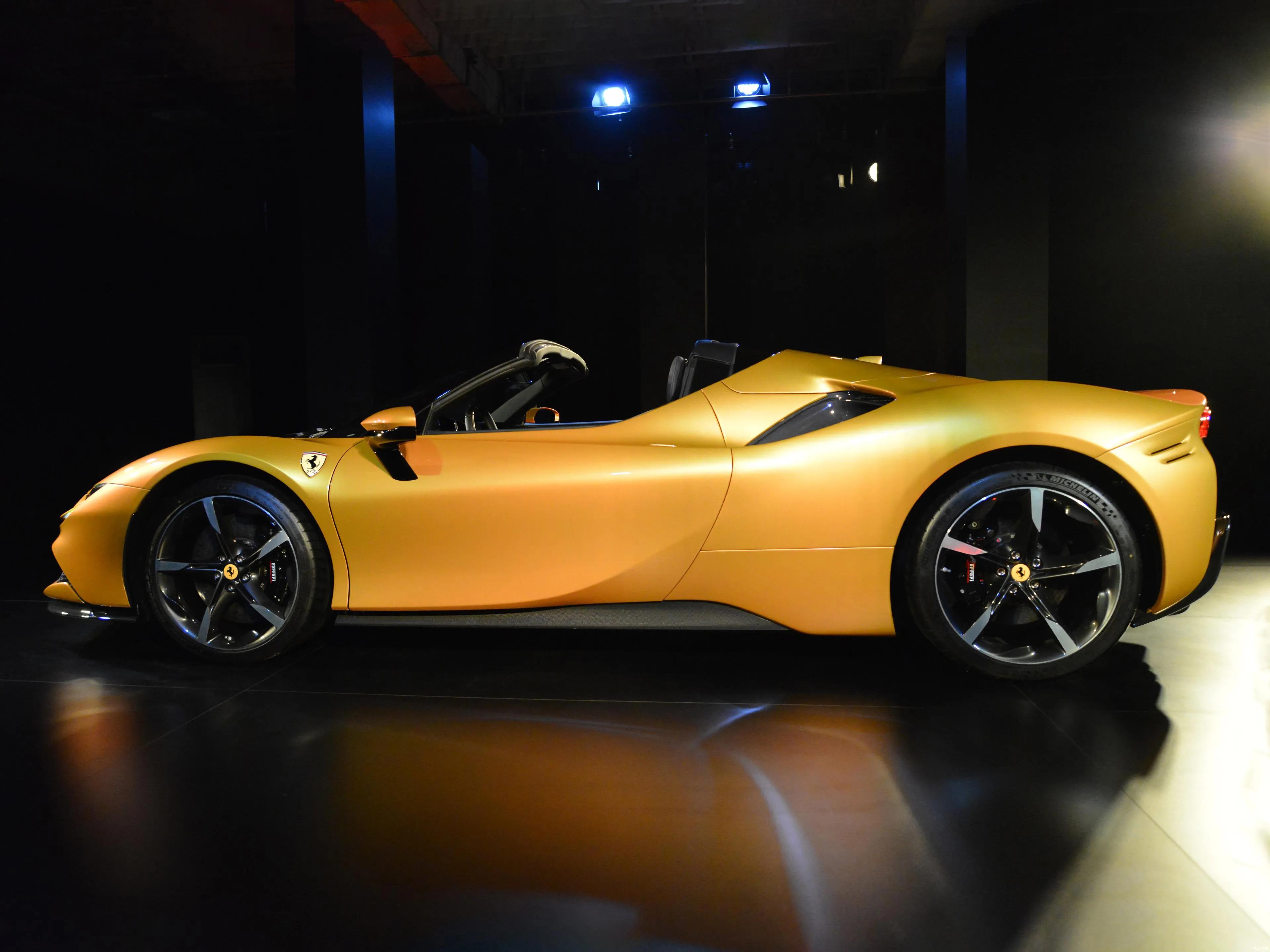 Ferrari SF90 Stradale 2021; the side curve of the body continues the ...