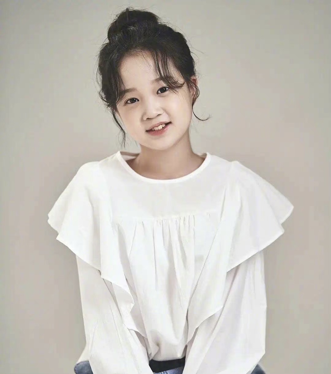 "Answer 1988" Pearl recently exposed, with a sweet smile on the ball head, or a small round face ...