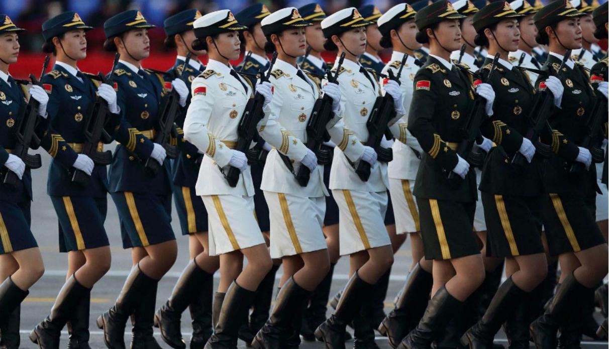 In the military parade, why do female soldiers have to wear "silk ...