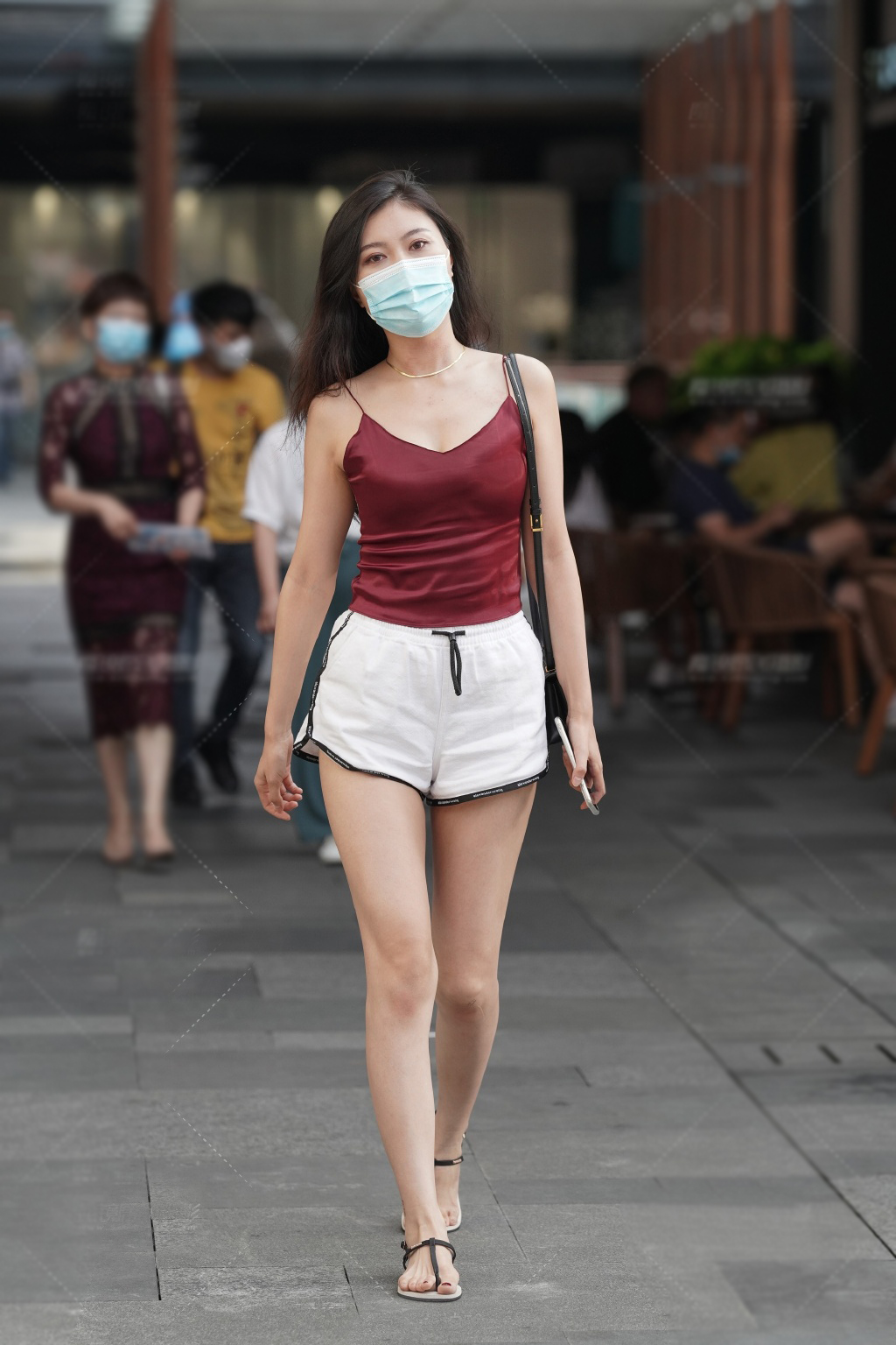 Cool white shorts outfit with maroon halter top, stylish, generous ...