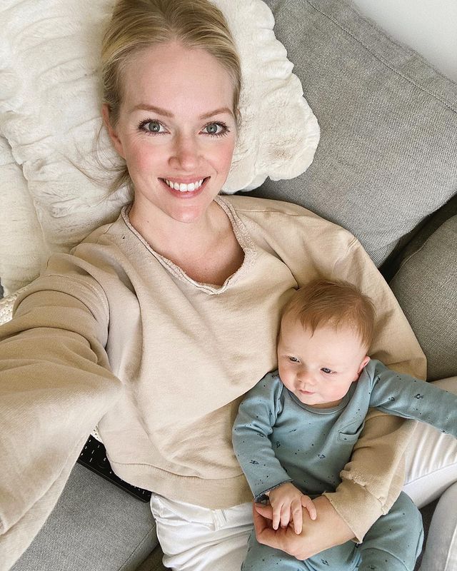Victoria's Secret Angel Lindsay Ellison: Holding a baby and taking ...