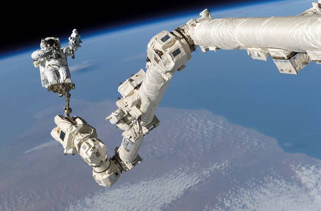 Tianhe core module robotic arm International Space Station Canada Arm 2 ...