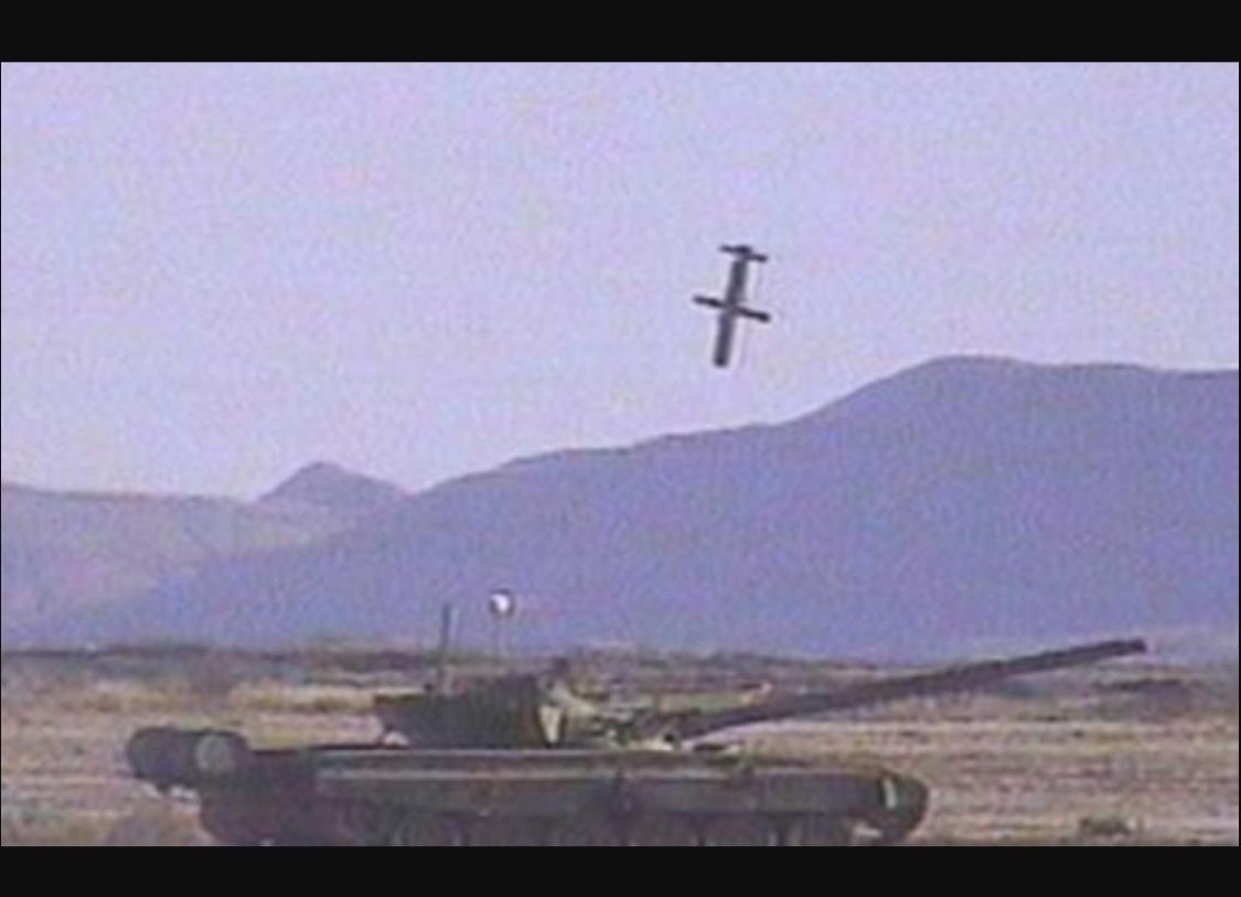 The Red Arrow-12 missile exploded just above the tank, blasting the ...