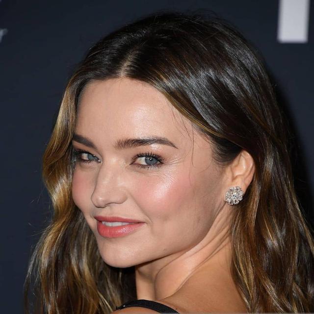 Supermodel Miranda Kerr wears a retro little black dress, quite like a ...