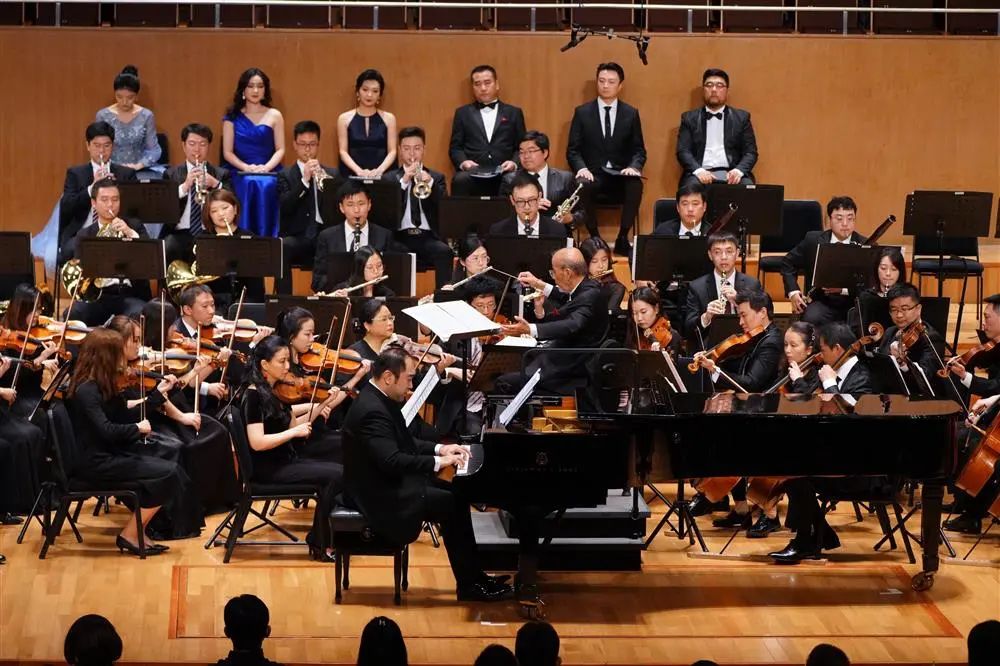 To transfer the light and heat of music to more people, 96-year-old Cao ...