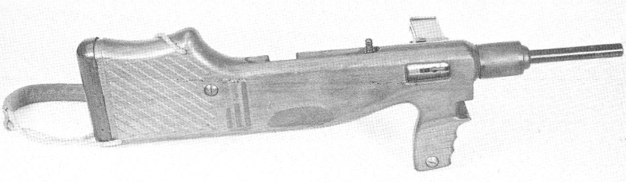 A close relative of the Stern submachine gun, the British one-handed ...
