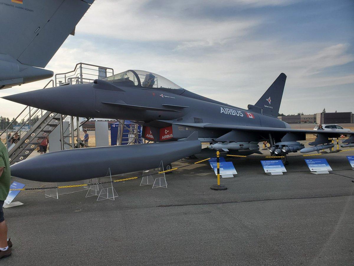 What weapons are mounted on the Typhoon fighter jets in the picture ...