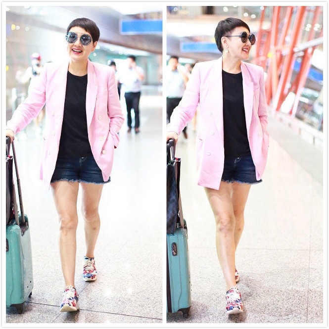 Zhang Kaili is well dressed and able to wear pink denim shorts, solemn ...