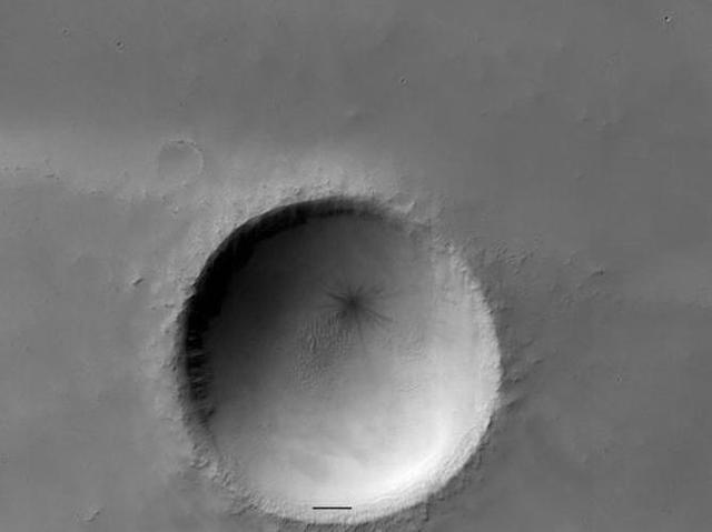 The rover sent back the picture, showing three side-by-side impact ...