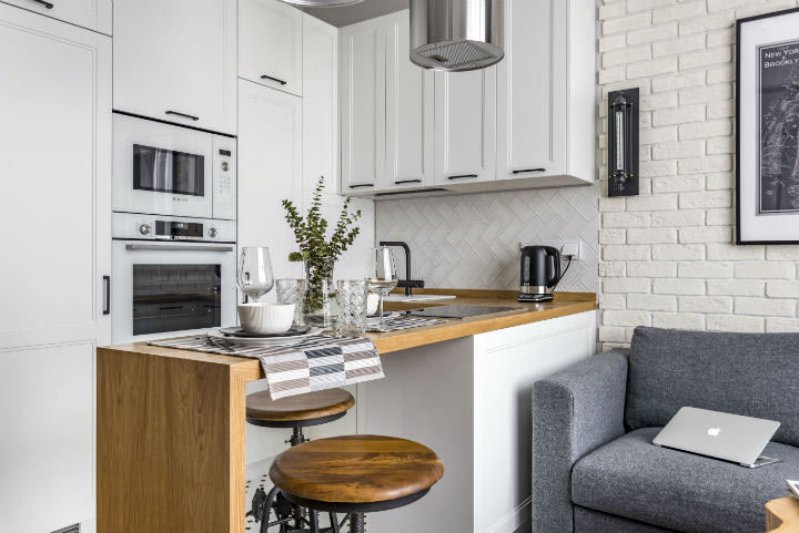 The kitchen and living room are integrated with a small apartment of 32 ...