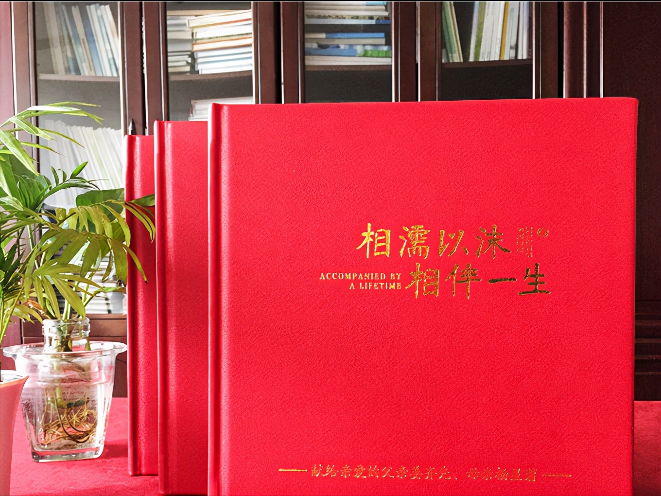 The method of designing a family memorial book to record family ...