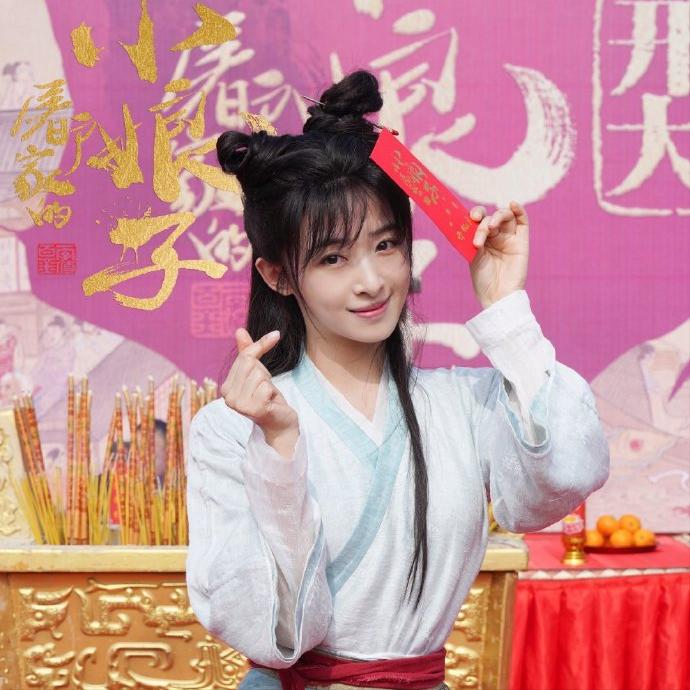 The 32-year-old Angela Chang starred as the little lady in costume. The ...