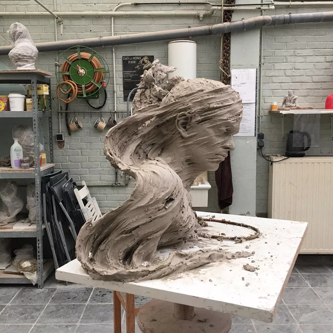 Luo Lirong sculpture - iNEWS