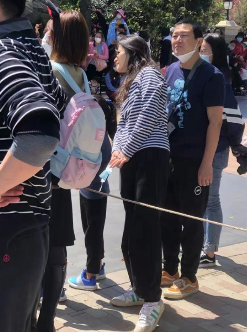 Mei Ting's family of four rarely showed up, dressed plainly and without ...