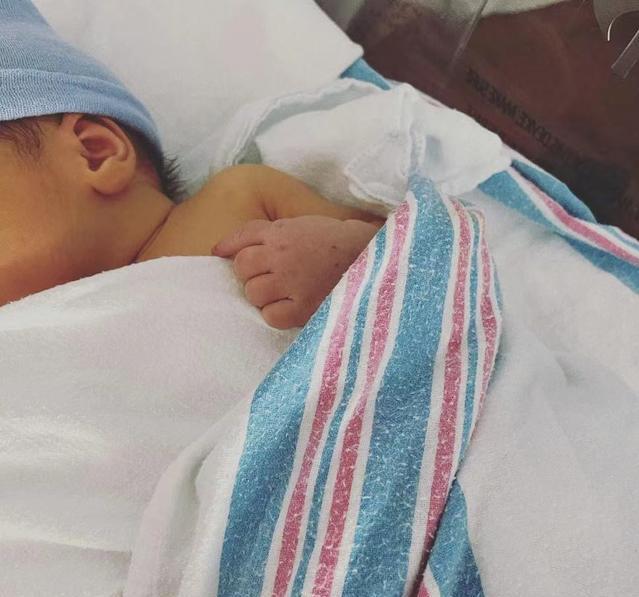 Supermodel Carly Klaus walks out the street with her baby in a ...