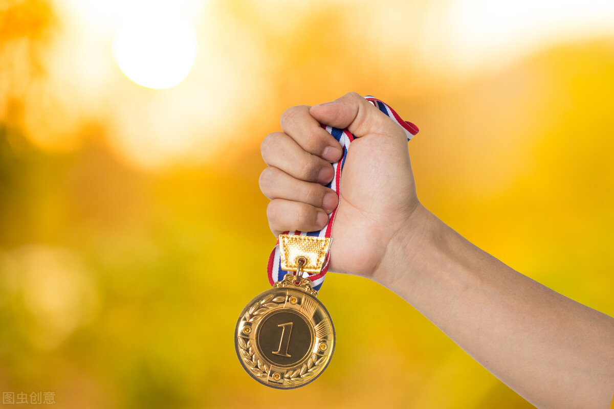 Why do Olympic gold medalists like to "bite" the gold medal when ...