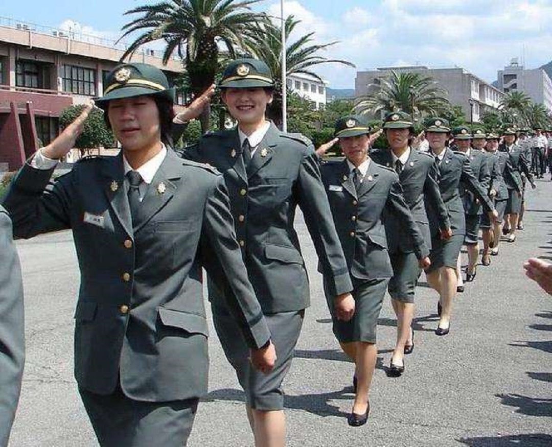 At the Japanese military parade, the small shoulder bag of the female ...