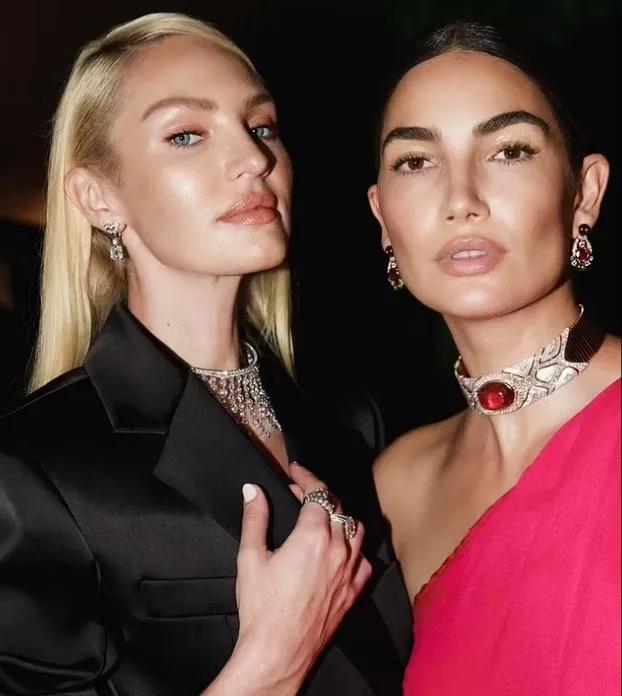 Supermodel, Candice Swanepoel dressed in an elegant black suit jacket ...