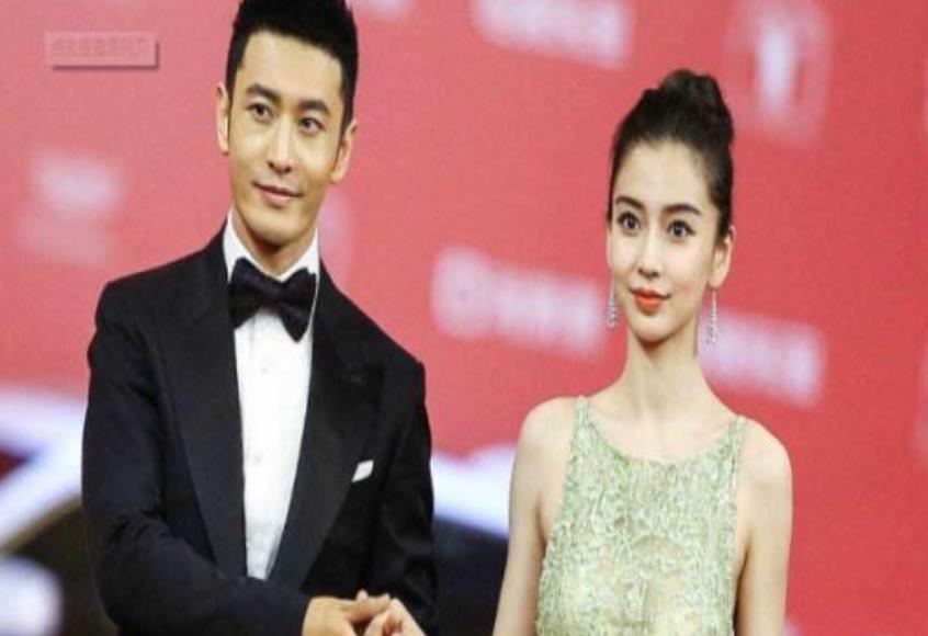 The actress took a photo with Huang Xiaoming, Xiaoming chose to put his hands in his pockets ...
