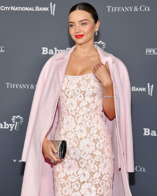 Supermodel Miranda Kerr wears a retro little black dress, quite like a ...