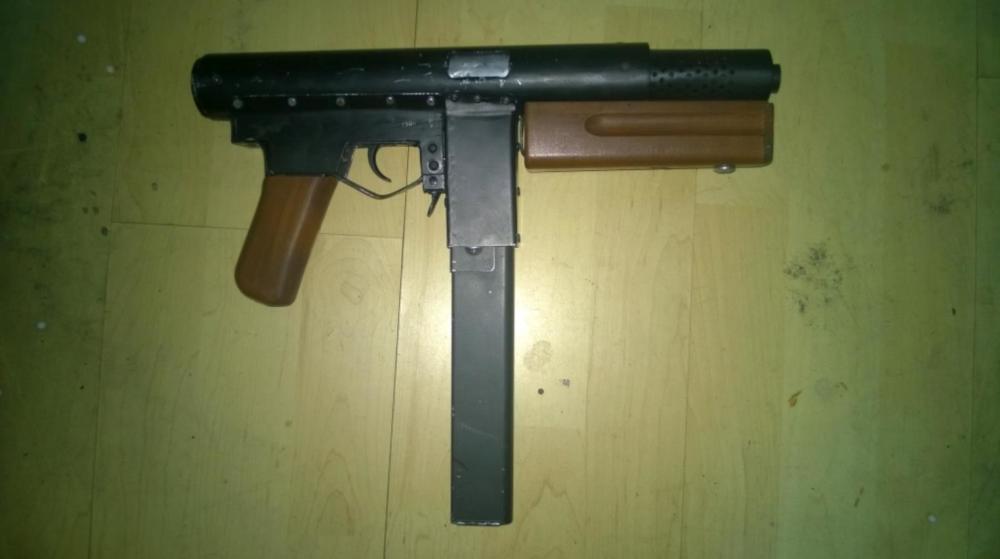 An earthen submachine gun produced by an underground workshop of ...