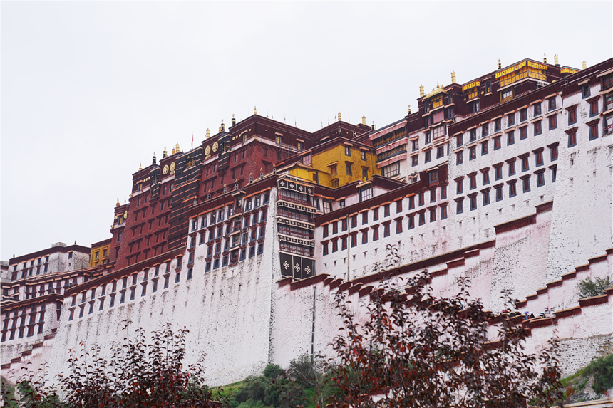 The tallest building in Lhasa, located halfway up the mountain, was ...