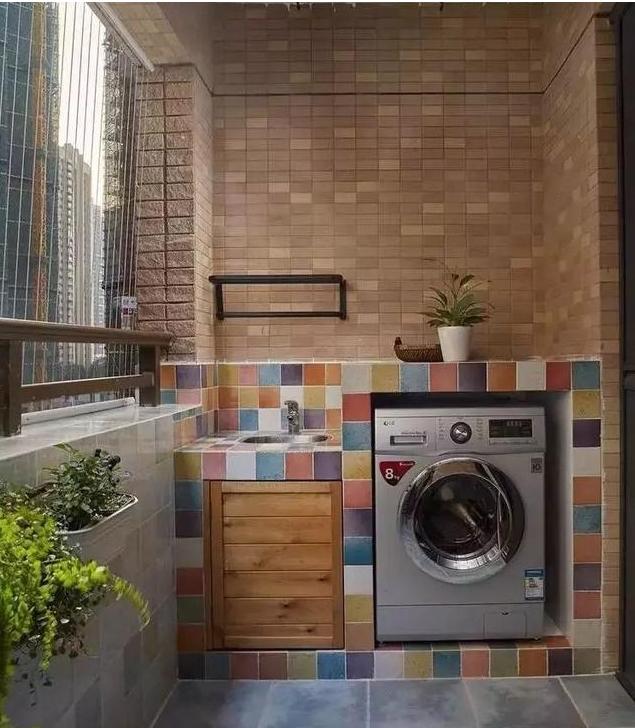 The balcony is made of bricks into a washing machine cabinet, which is ...