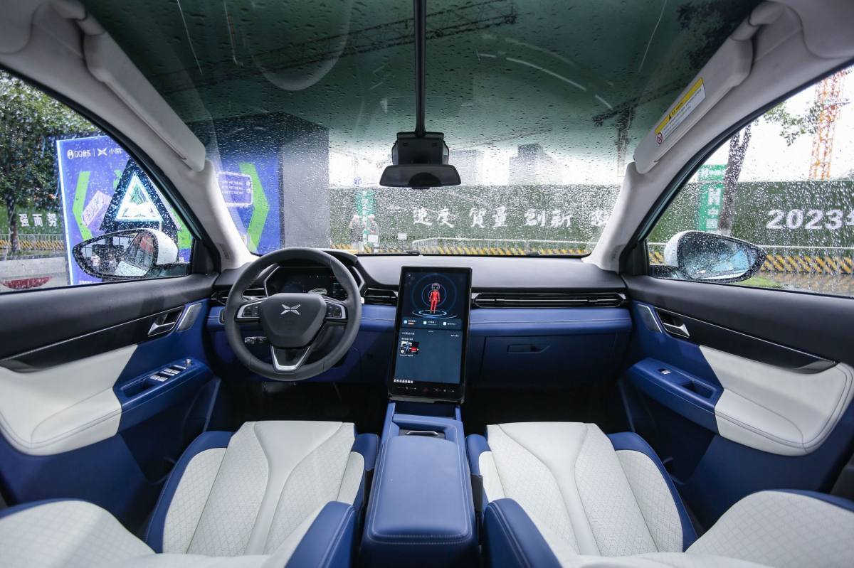 Xiaopeng G3i/Ola good cat, who can capture the heart of the young lady? - iNEWS