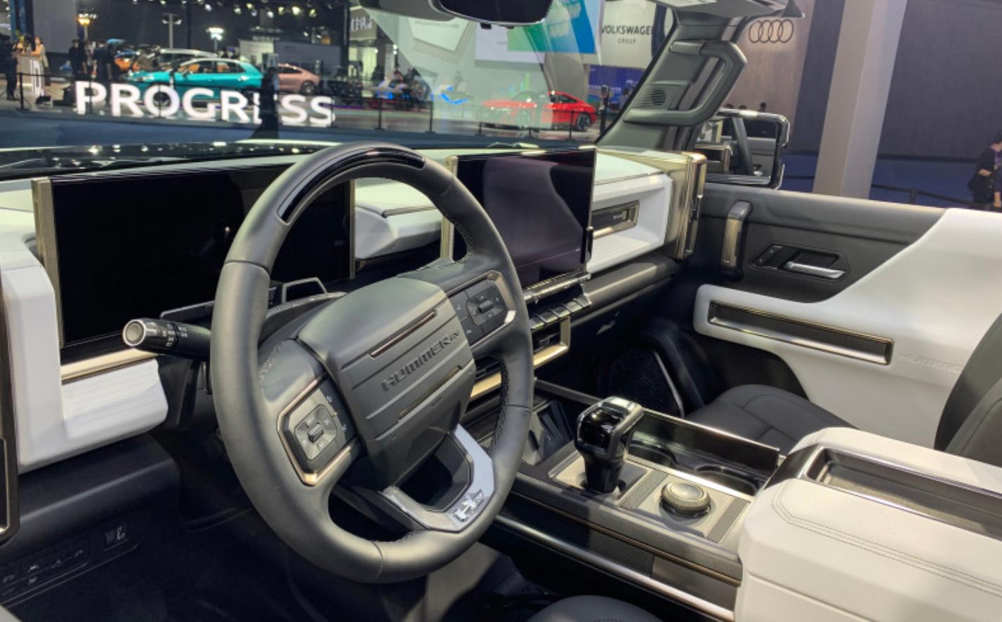 The electric Hummer is here, with a convertible and a cargo bucket ...