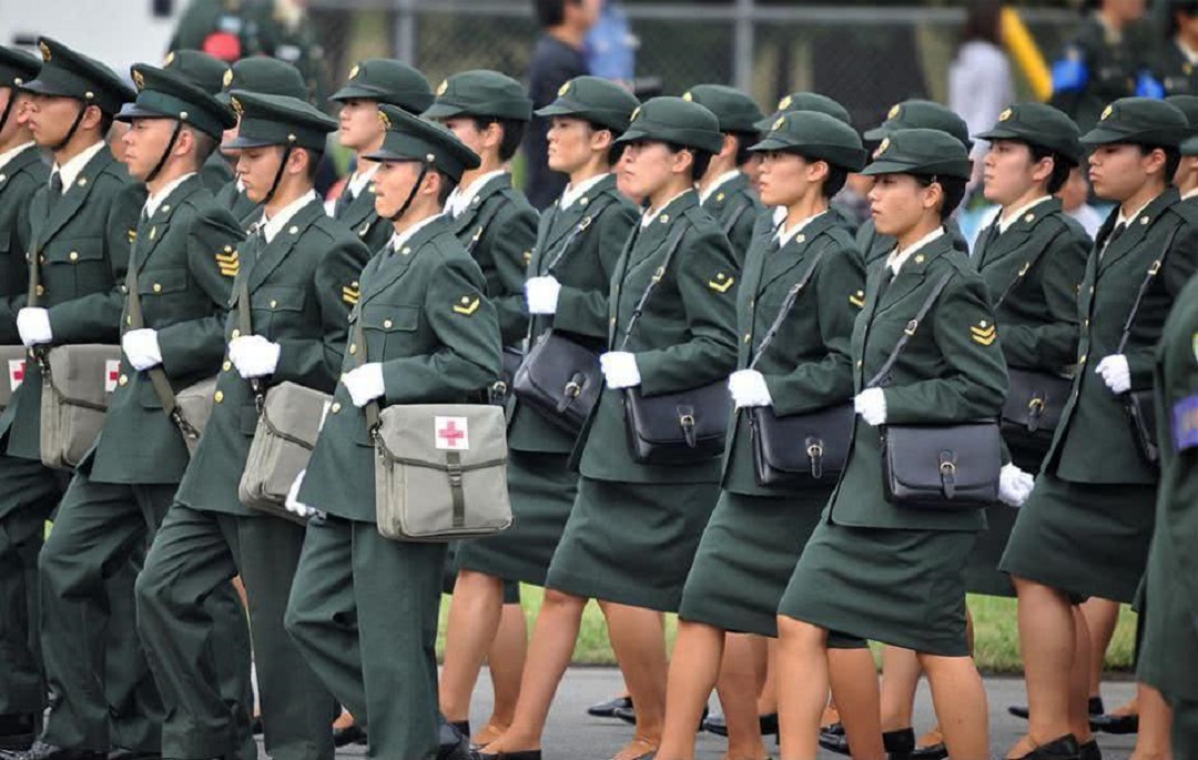 At the Japanese military parade, the small shoulder bag of the female ...