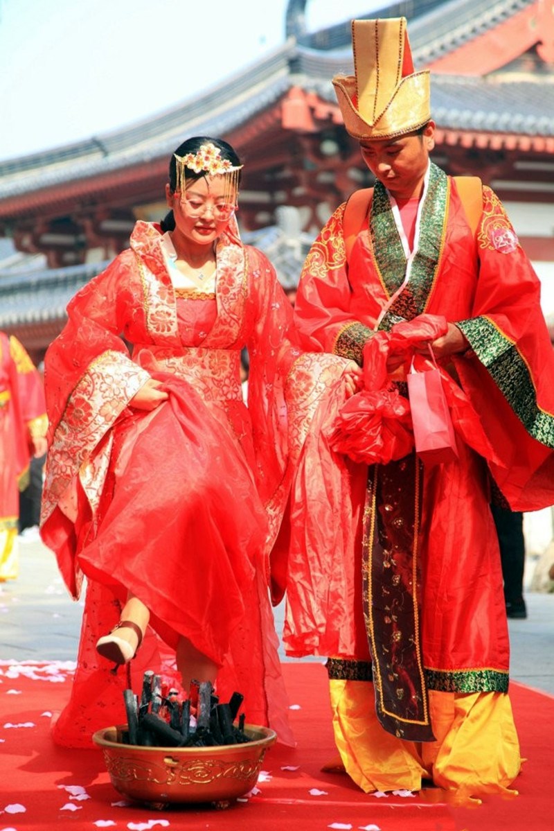 Why does the bride cross the brazier when going to the door?Why use a ...