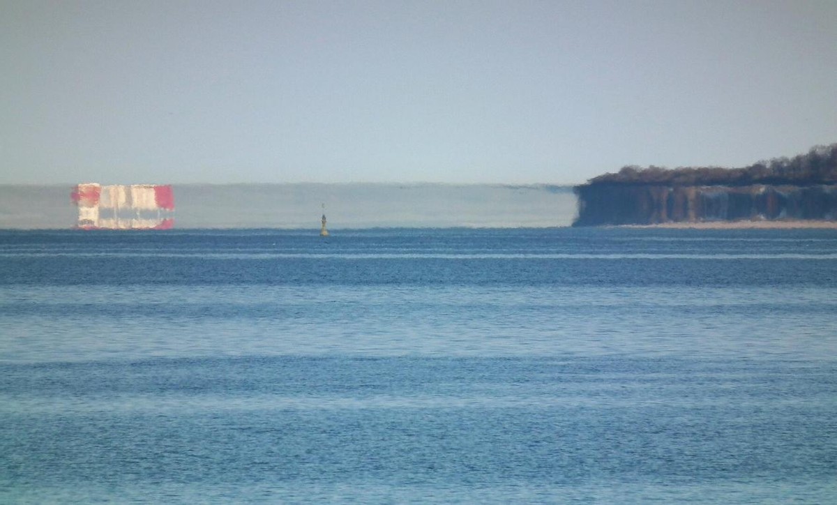 Real, phantom?Alaska UFO was photographed, as big as an island, like a ...