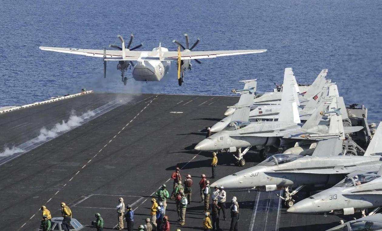 On a high-tech integrated aircraft carrier, why is the gesture language ...