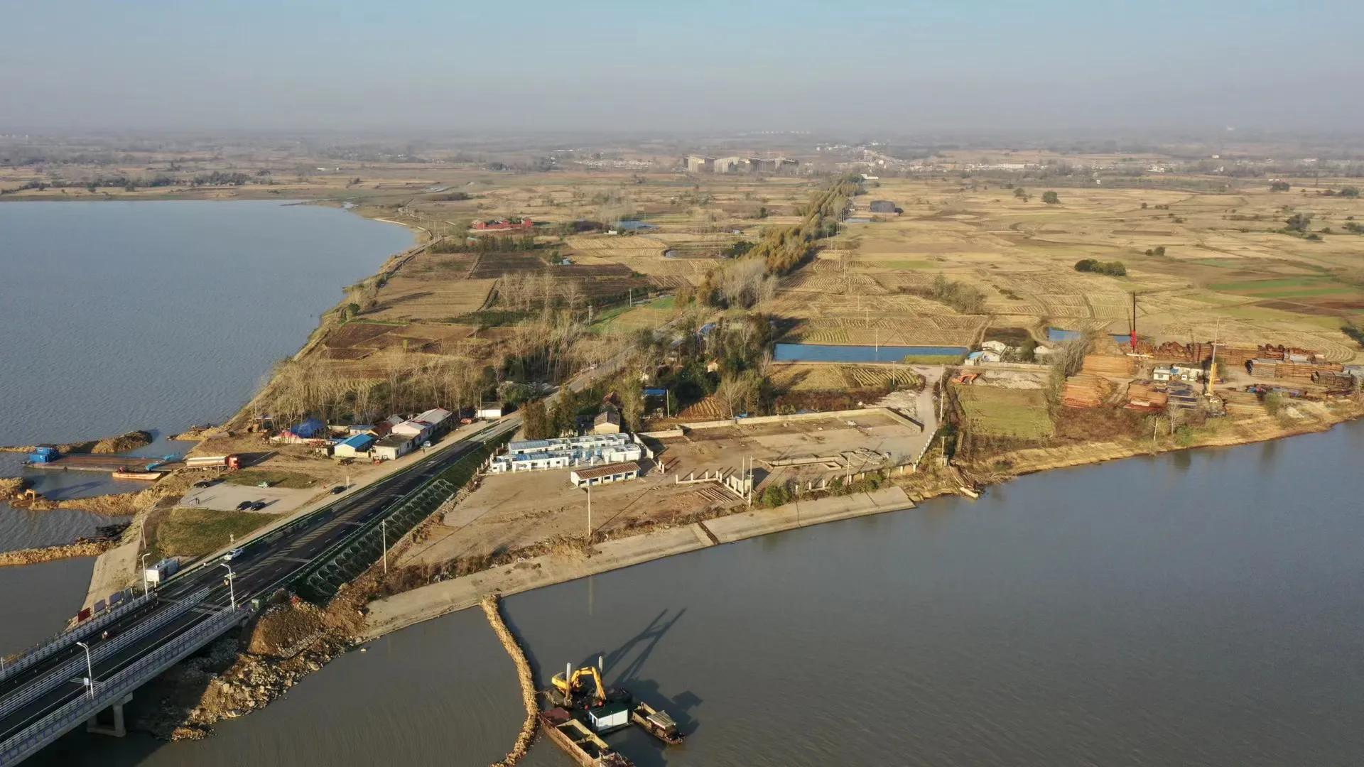 One bridge spans east and west, and Wabu Lake becomes a thoroughfare ...