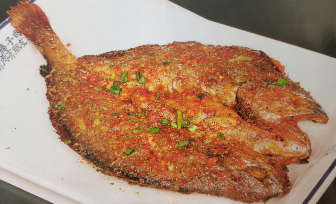 The charcoal grilled crispy yellow croaker has a crispy skin and tender ...