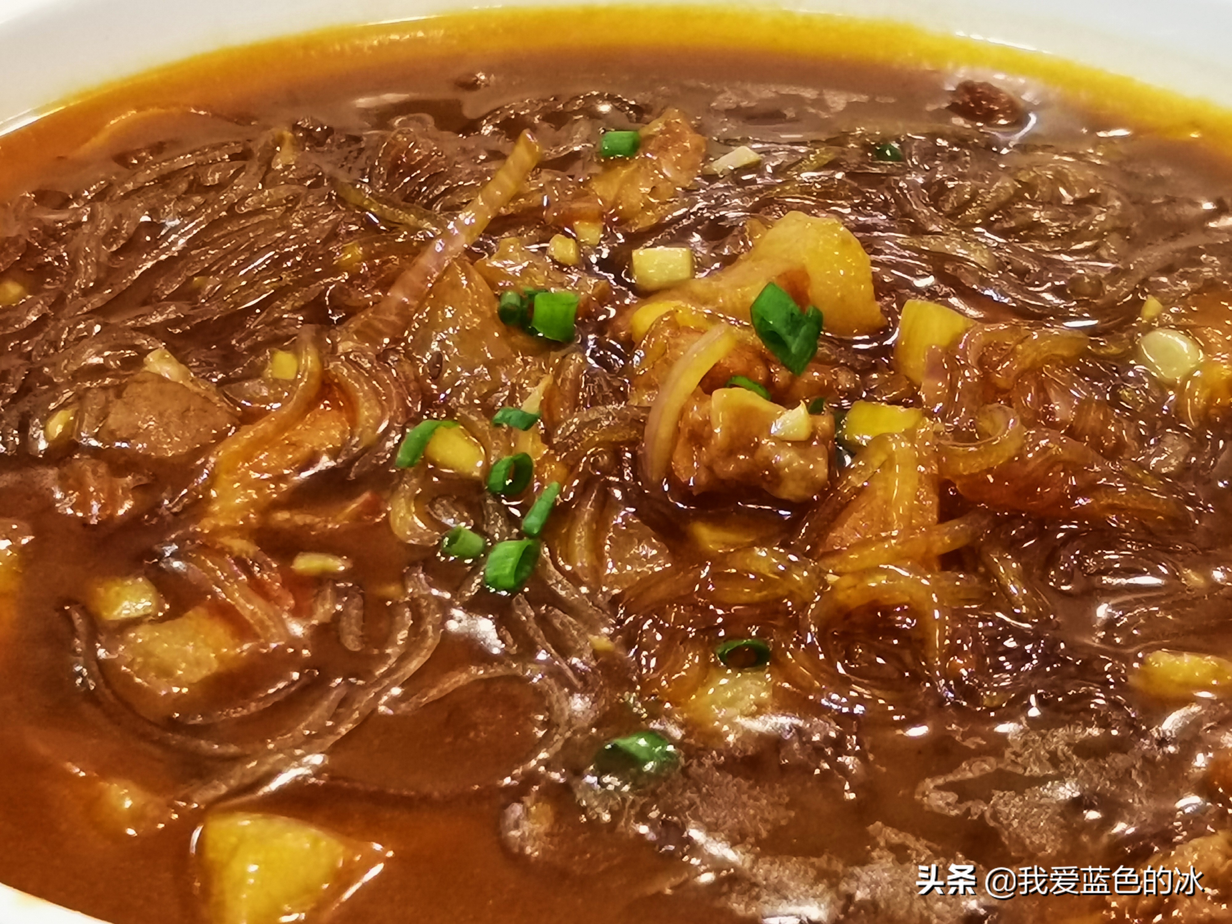 After a meal, I learned that Harbin's famous dish "Guo Bao Rou" was ...