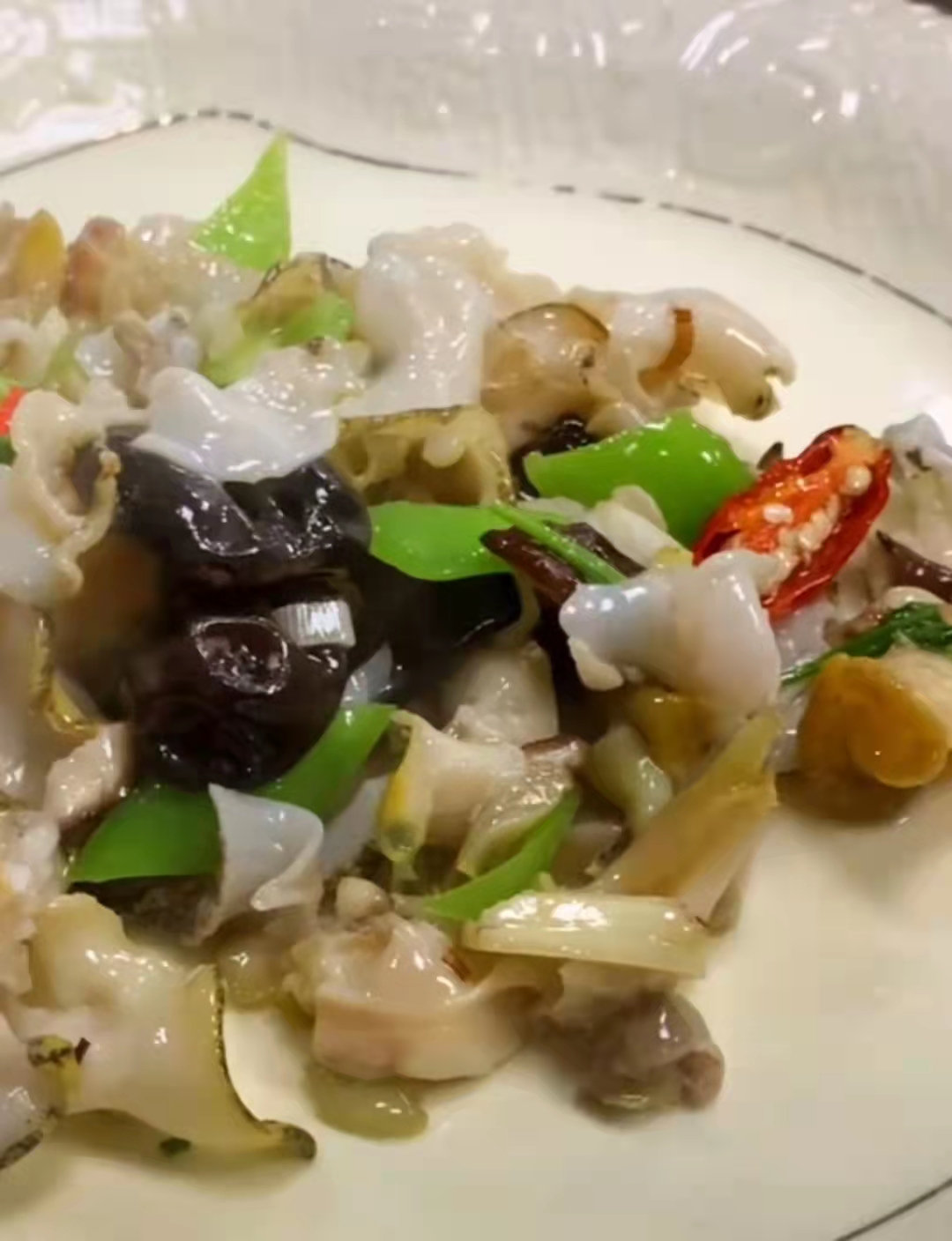 Stir-Fried Conch, the delicacy of seaside people, can easily make the ...